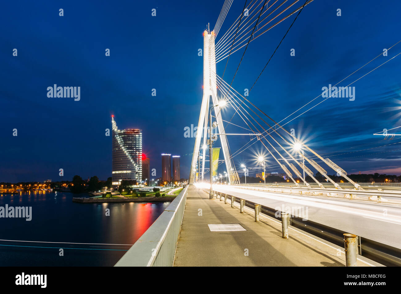 Riga, Latvia. Vansu Cable-Stayed Bridge In Bright Night Illumination ...