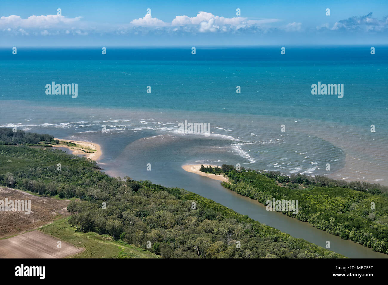 Aerial view of Thomasis Creek, an anabranch of the Barron River at ...