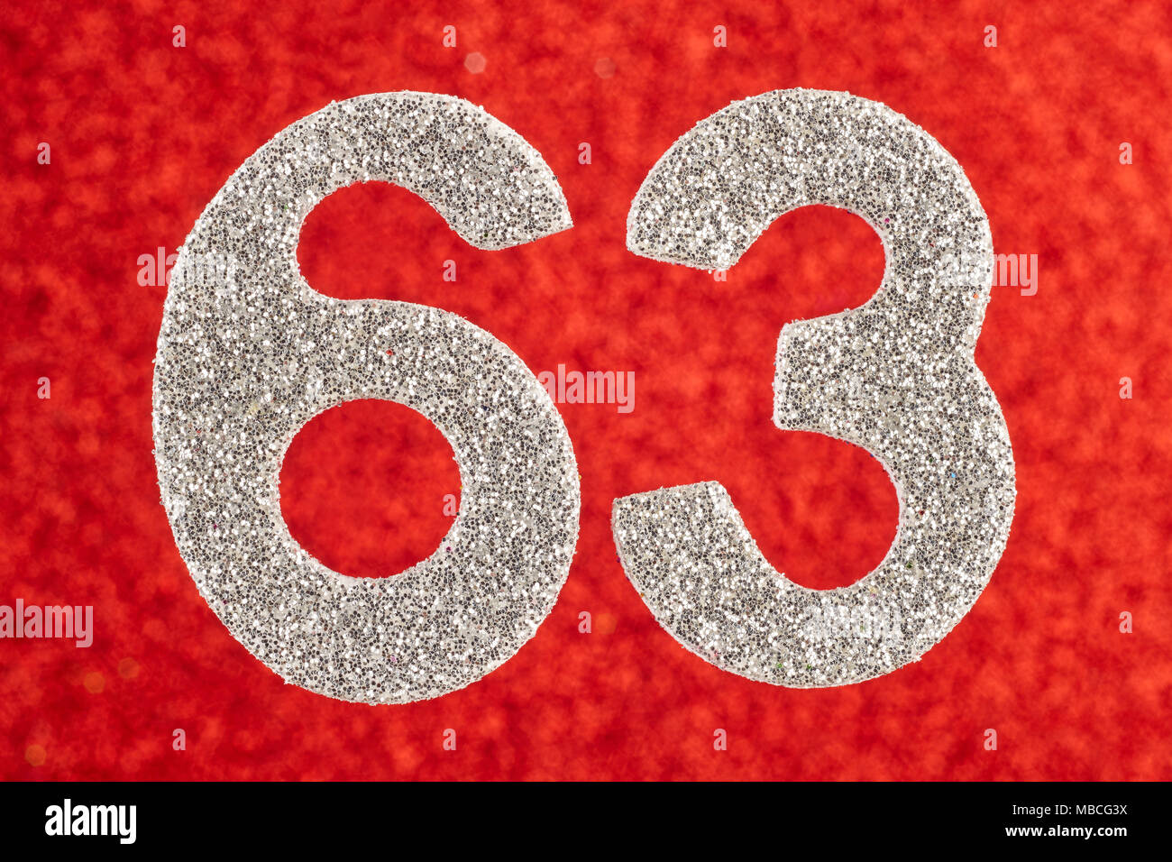 Number sixty-three silver color over a red background. Anniversary ...