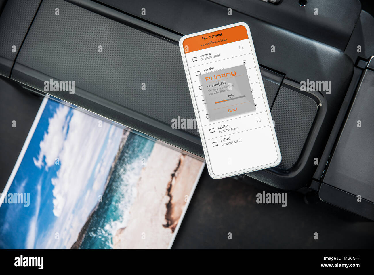 Smartphone connected with wireless photo printer sending file to print ...