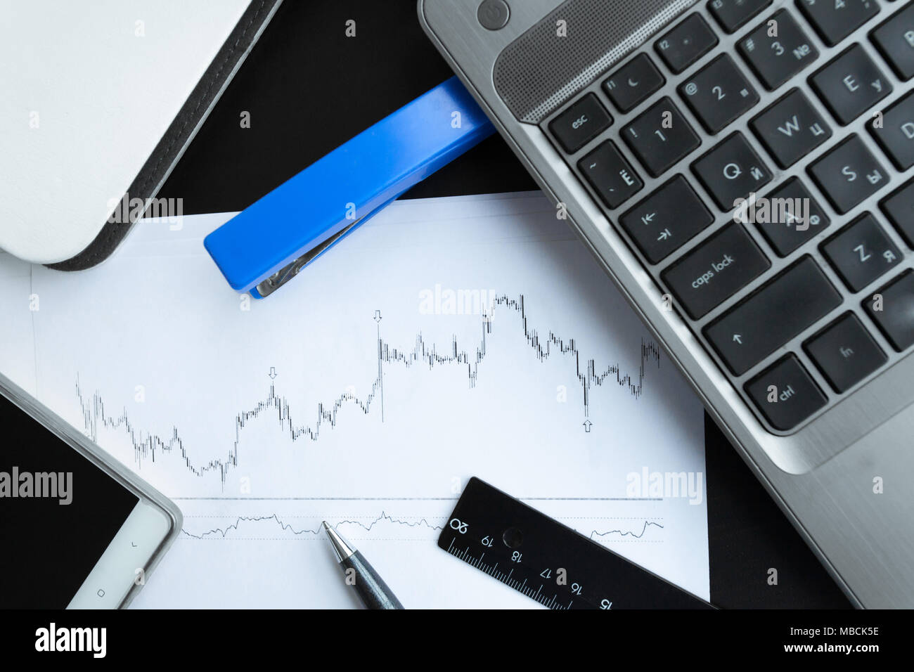 Stock chart and office tools Stock Photo - Alamy