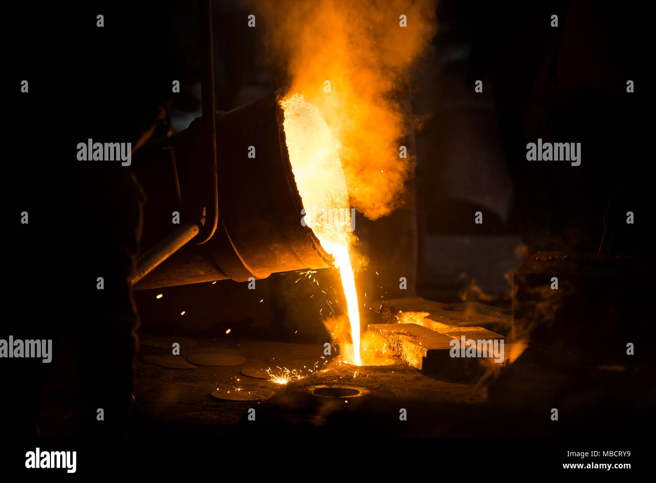 Metal melting, industrial casting Stock Photo - Alamy