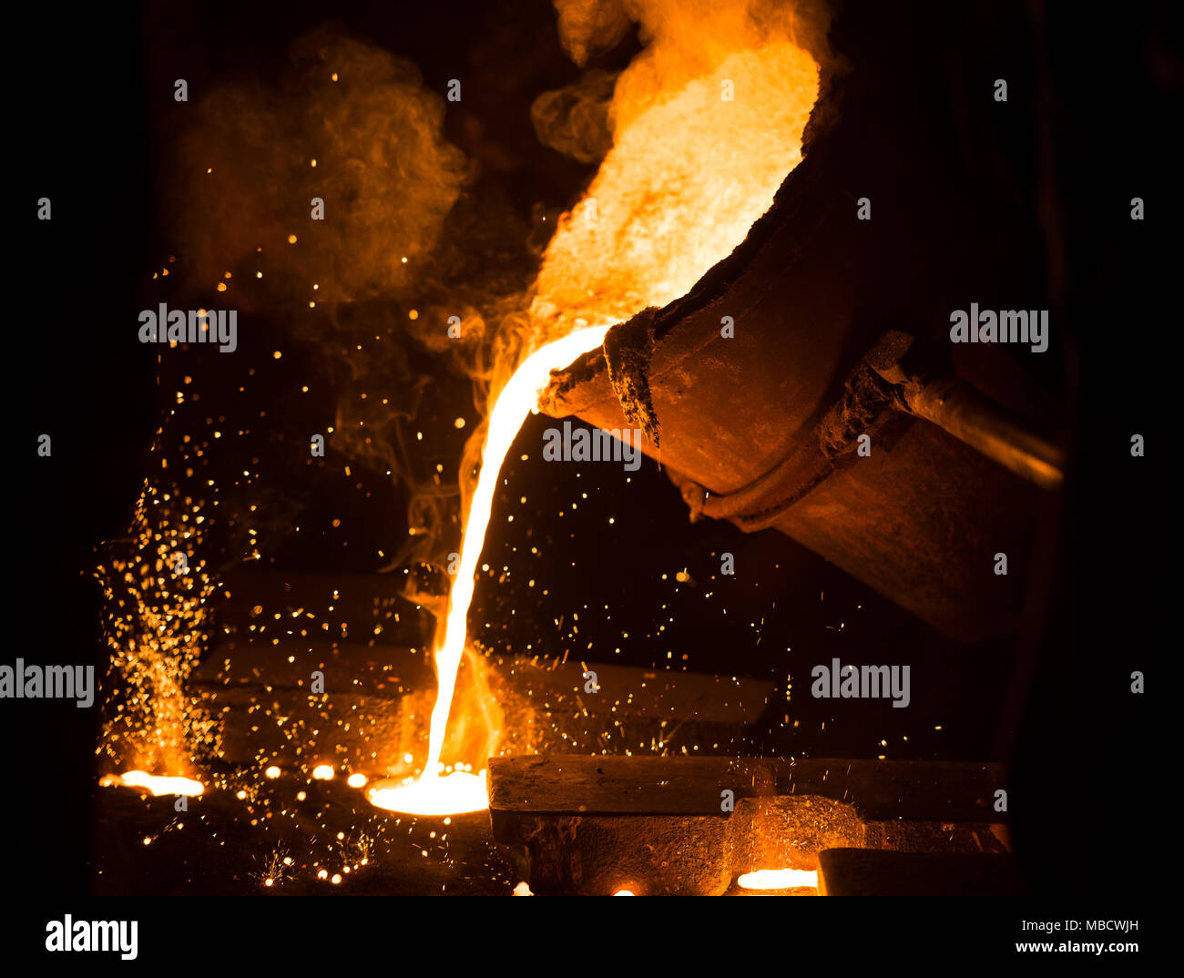 Metal melting, industrial casting Stock Photo - Alamy
