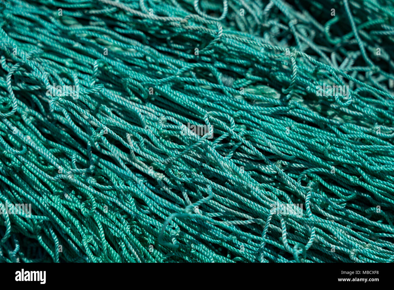 Background texture of green and white fishing net Stock Photo - Alamy