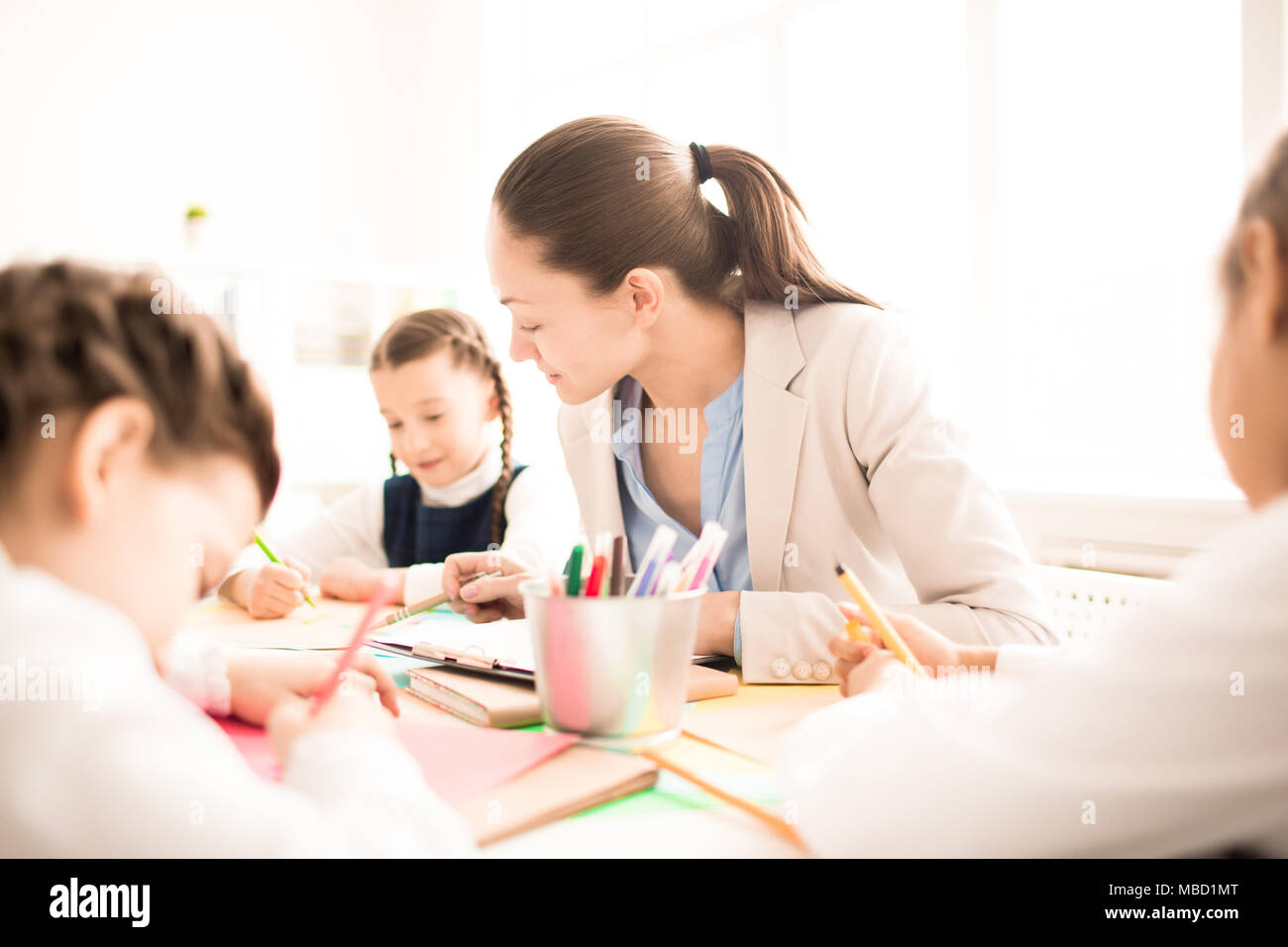 Elementary school students painting hi-res stock photography and images ...