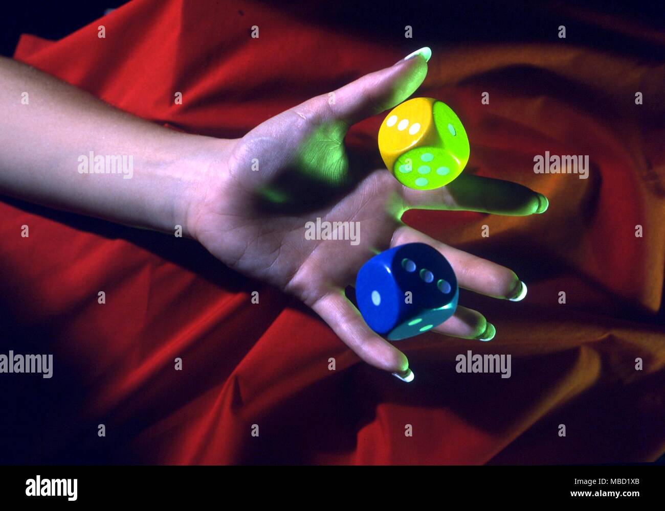 Dice being thrown hi-res stock photography and images - Alamy