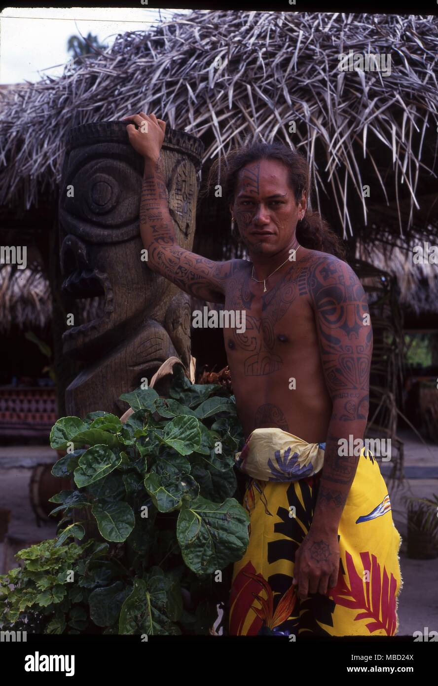 Polynesian facial and body tattoos Stock Photo - Alamy