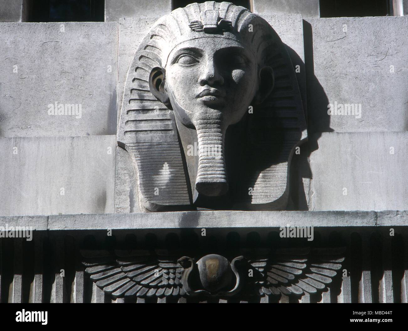 Egyptian mythology - Pharonic head with winged disc, on a building near ...