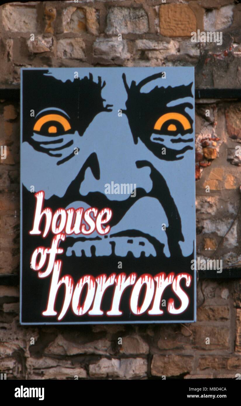 Horror - Large painted sign of monster face on the exterior of the ...
