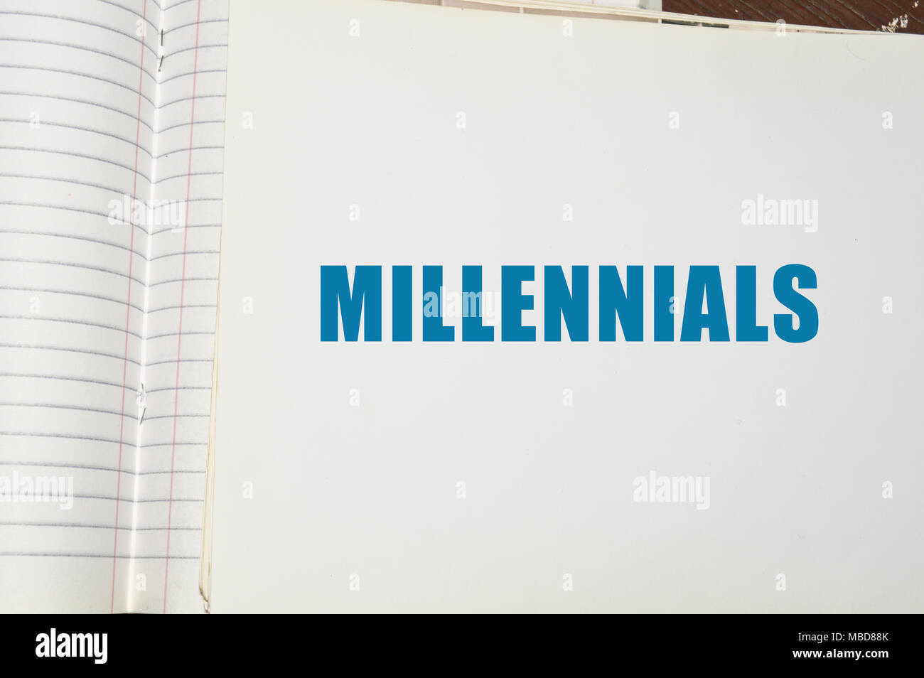 Millennials word written on white paper Stock Photo - Alamy