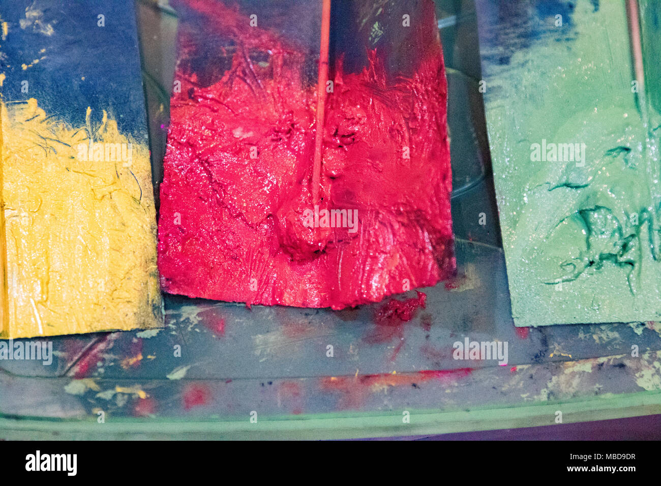 Actors paints on paper, ready to be applied in Munnar, India Stock ...