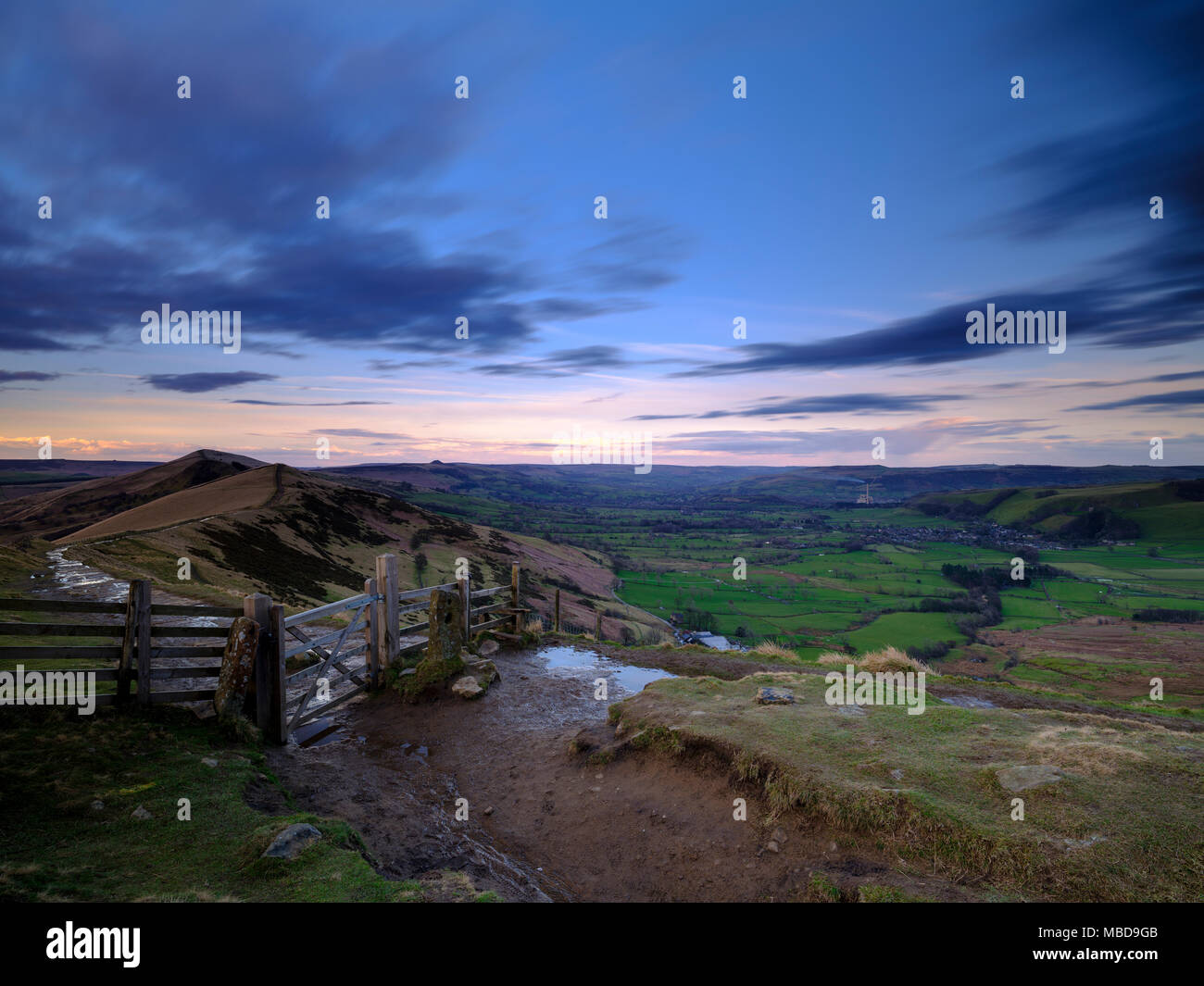 Spring Evening Sunset on Mam Tor at the iconic gate near the Iron Age ...