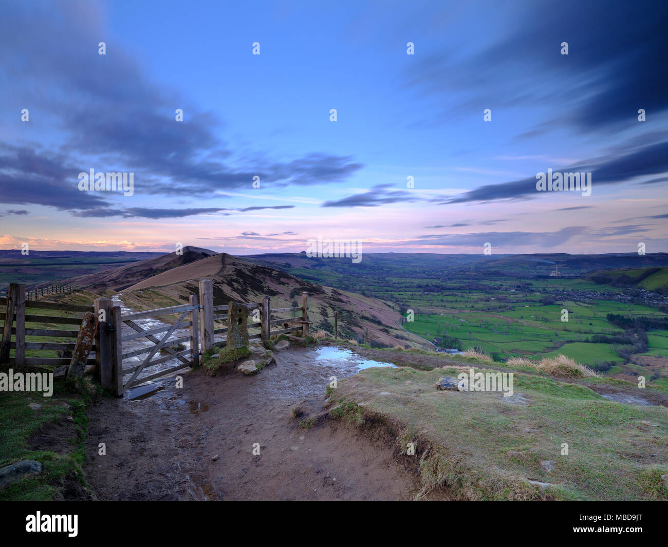 Spring Evening Sunset on Mam Tor at the iconic gate near the Iron Age ...