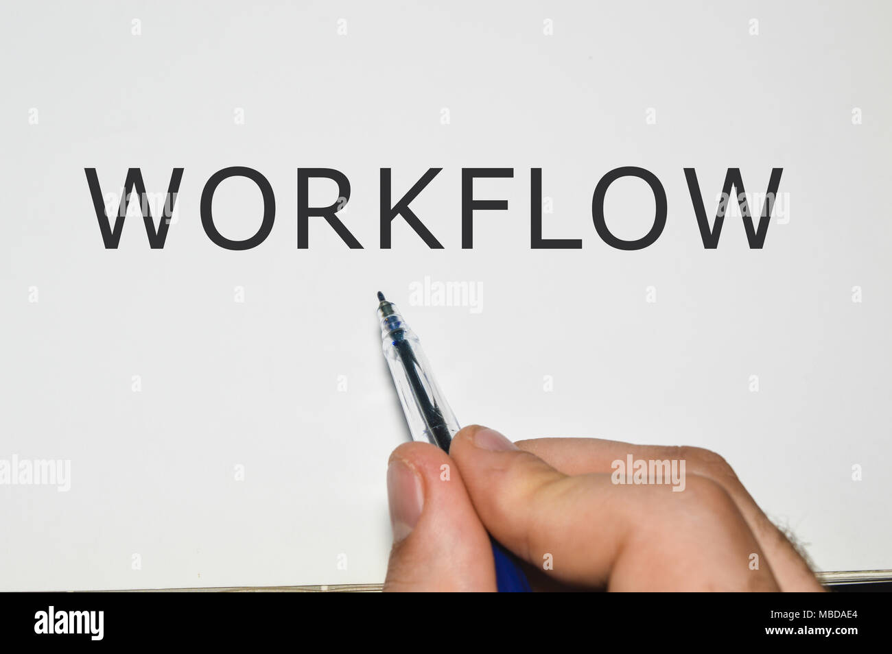 workflow word written on white paper Stock Photo - Alamy