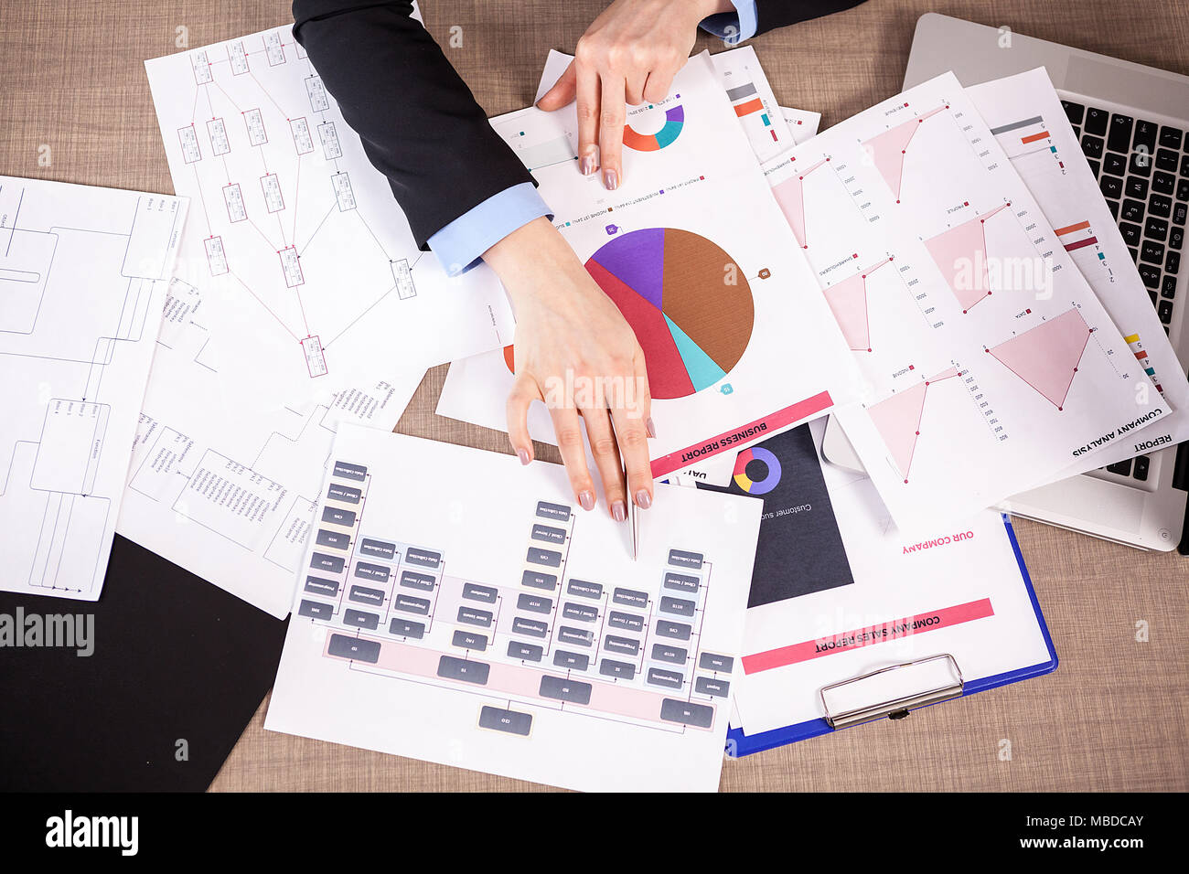 Multiple charts and diagrams on the table Stock Photo - Alamy
