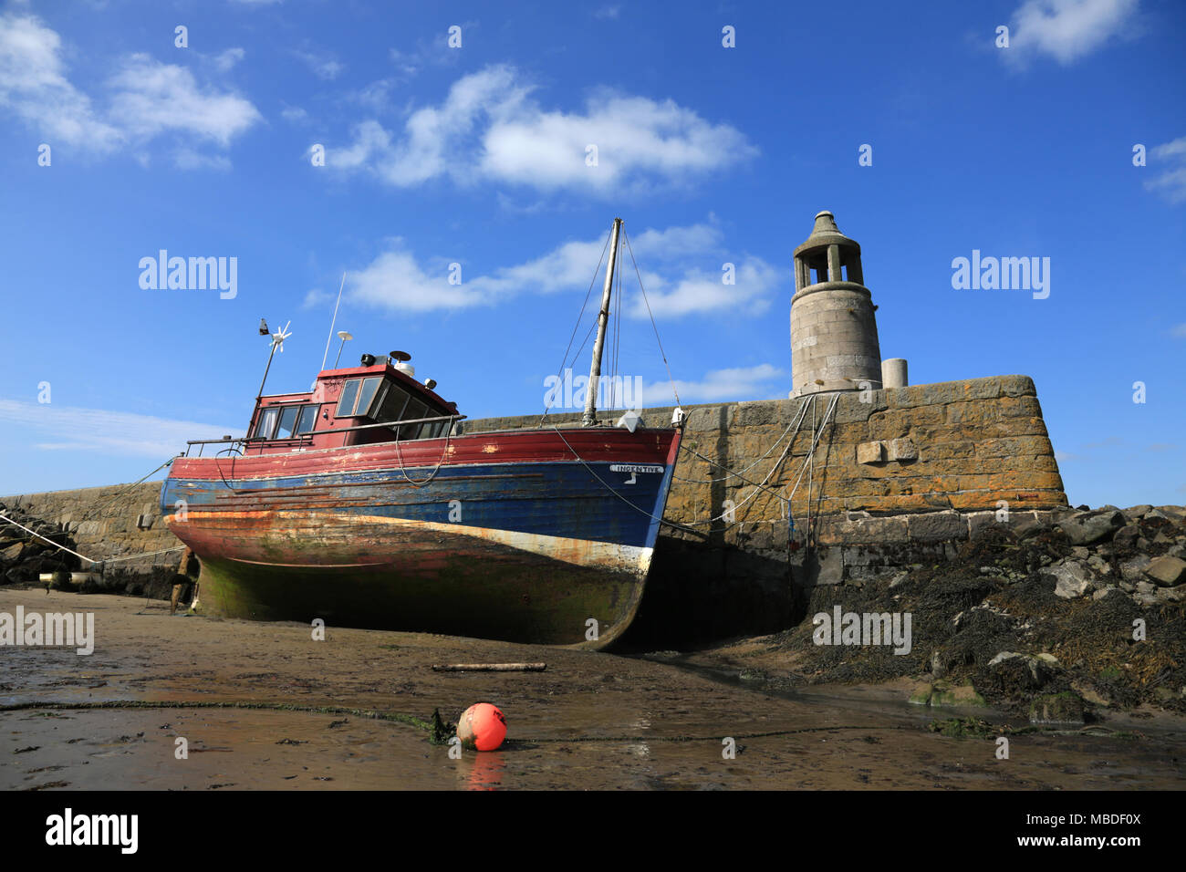 Fishing boat moored at Port Logan harbour in Dumfries and Galloway ...