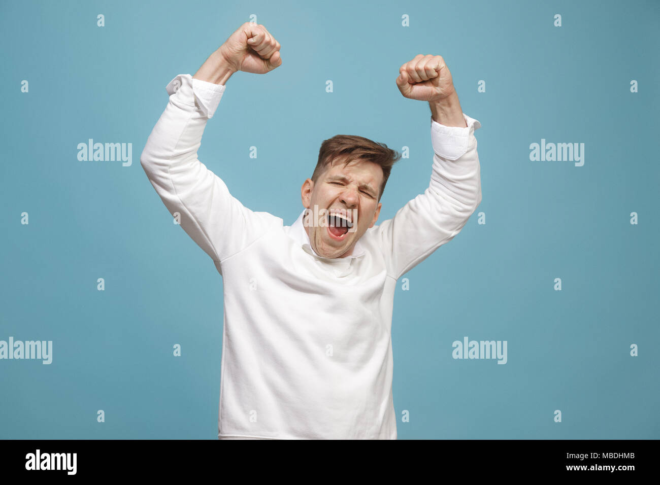 Winning success man happy ecstatic celebrating being a winner. Dynamic ...