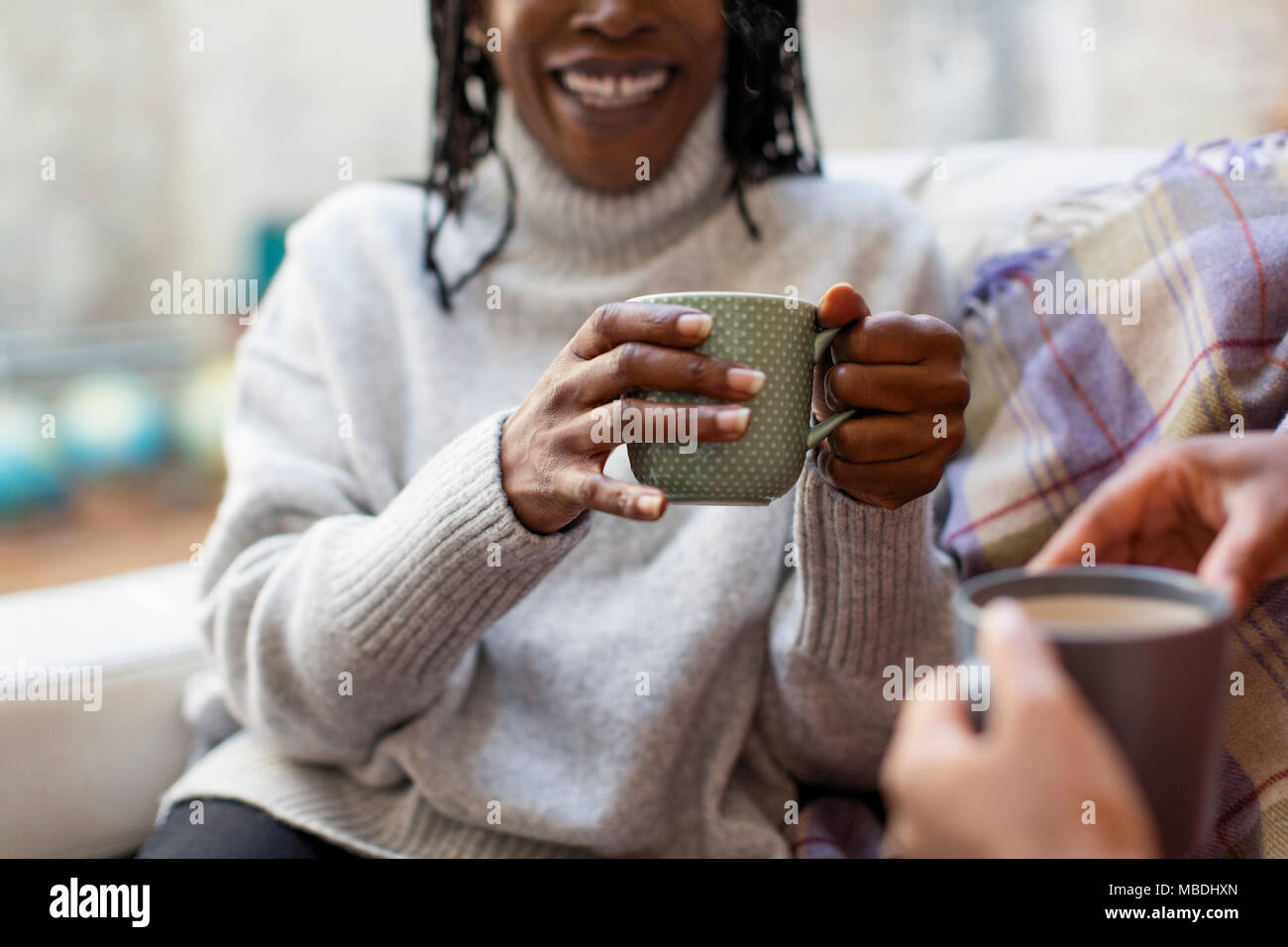 Woman drinking tea sitting on hi-res stock photography and images - Alamy