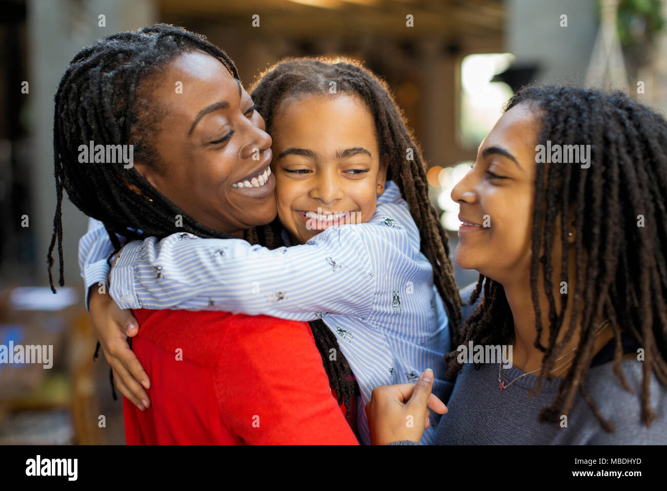 Mother two daughters standing together hi-res stock photography and ...