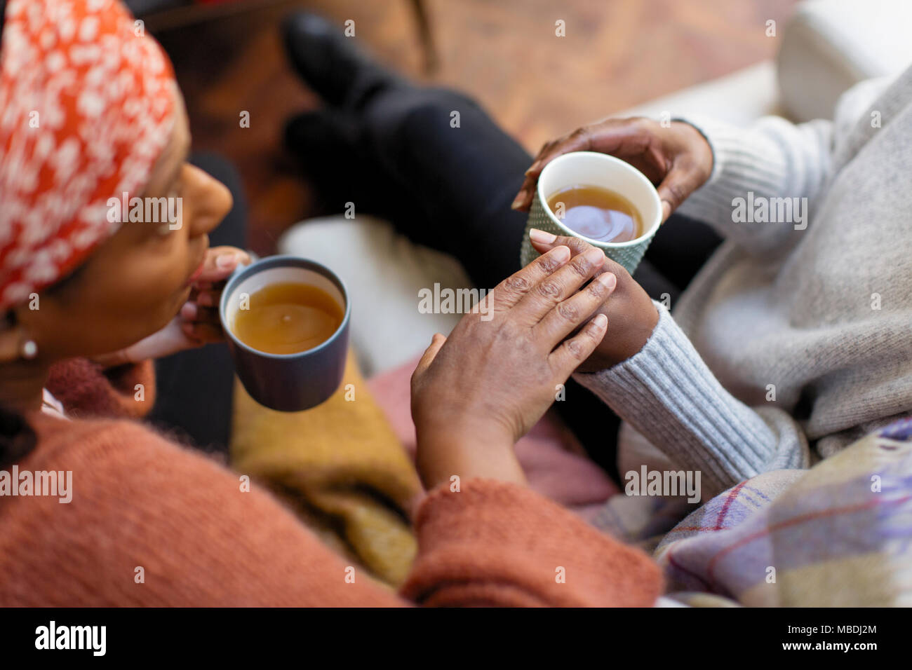 Women friends talking, drinking tea Stock Photo - Alamy