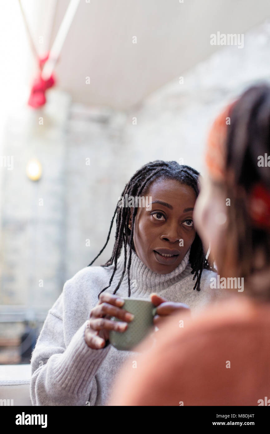 Two friends talking serious hi-res stock photography and images - Alamy