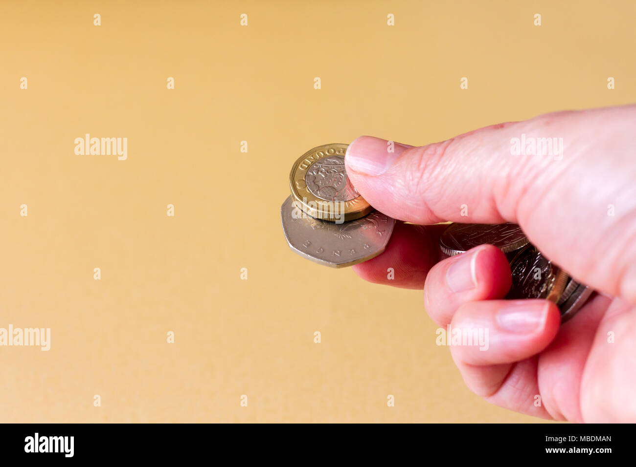 Small change money Stock Photo - Alamy