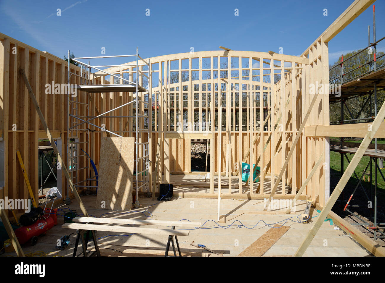 Timber framed construction project while in progress. Glulam and pine wood design. Selfbuild ...