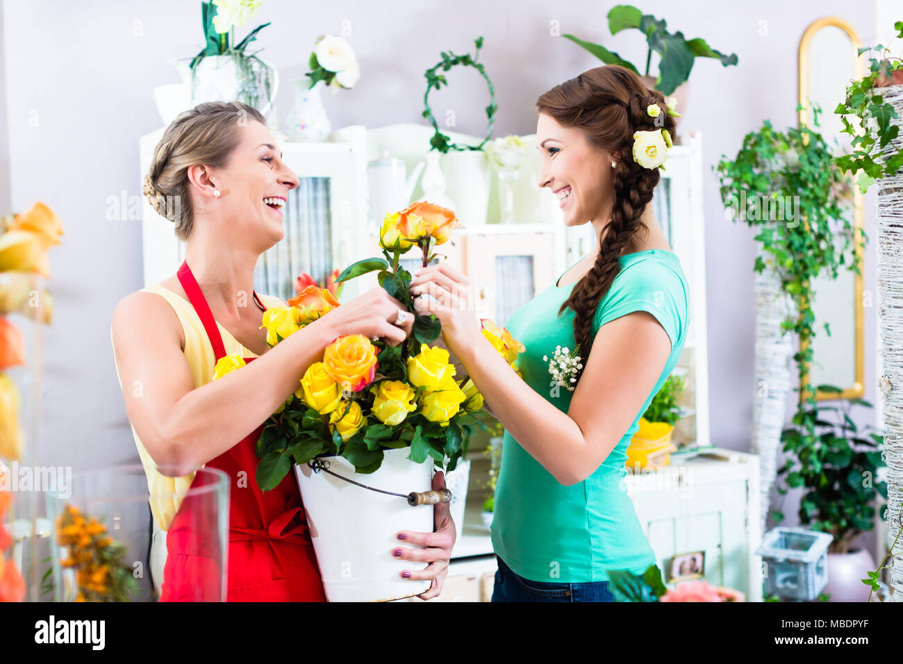 Flower shop assistant in hi-res stock photography and images - Alamy