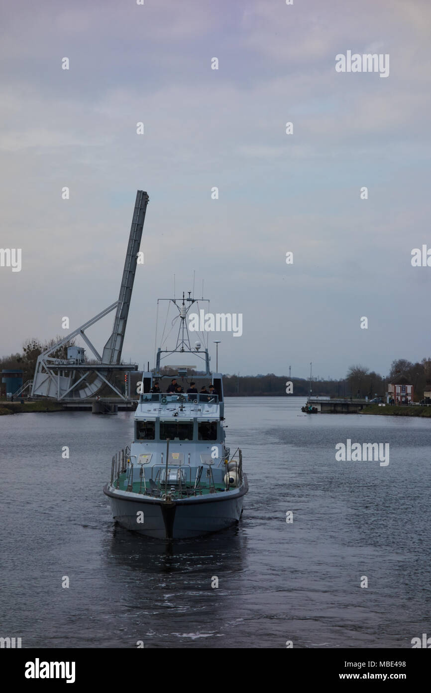 Royal Navy P2000 HMS Express P163 passing through Pegasus Bridge in ...