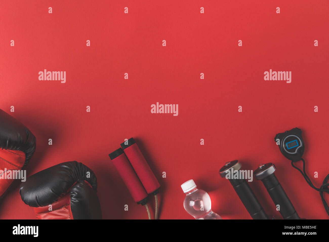 top view of boxer training supplies on red surface Stock Photo - Alamy