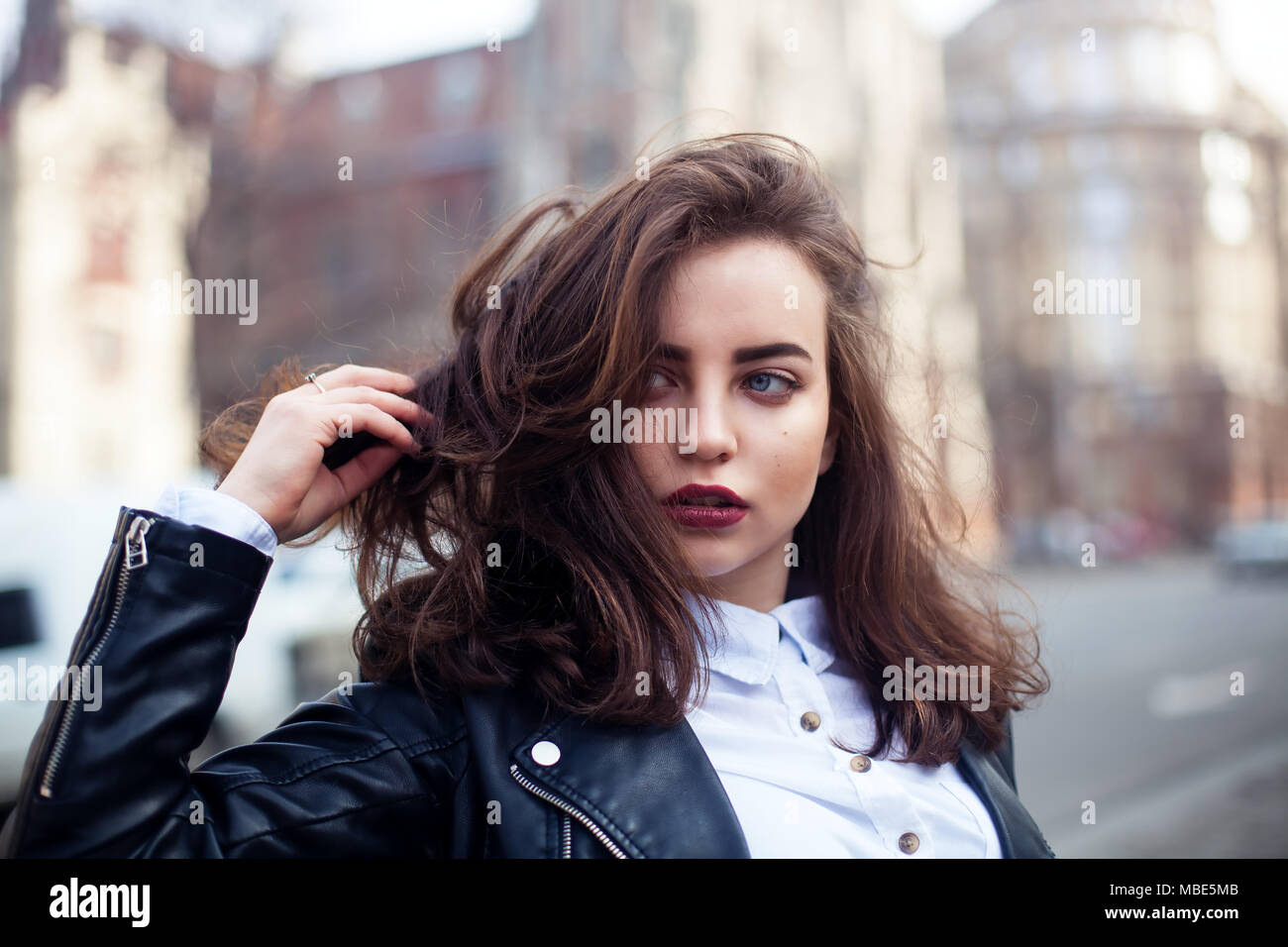 Amazing joyful pretty girl with long brunette hair. posing outdoor ...