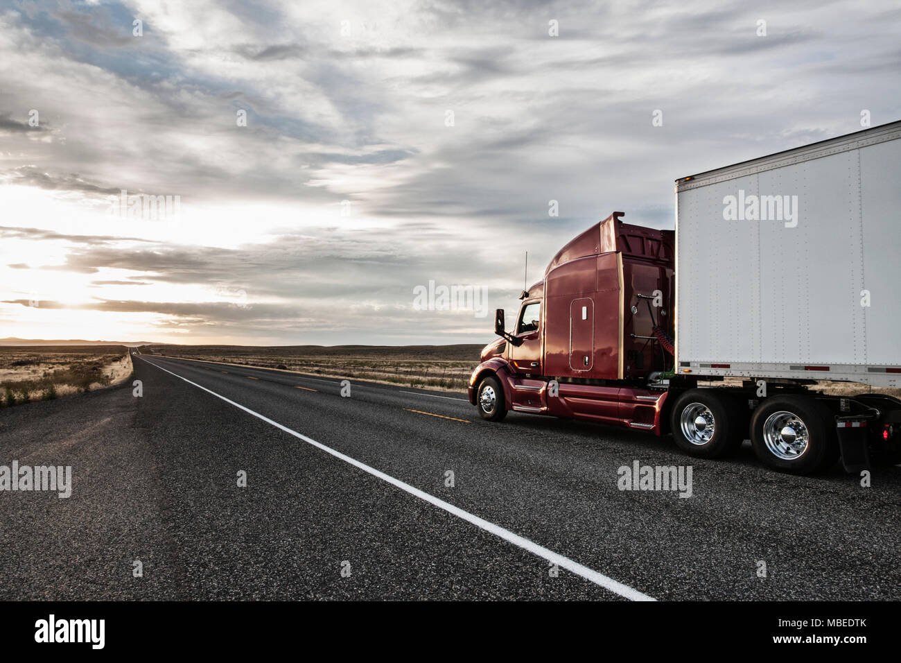 Side view of the cab of a commercial truck on the highway in eastern ...
