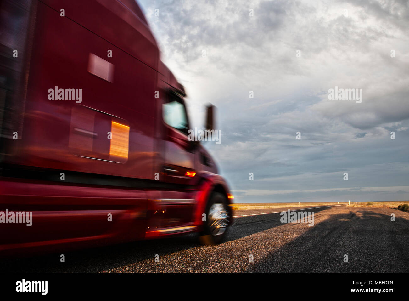 Side view of the cab of a commercial truck on the highway in eastern ...