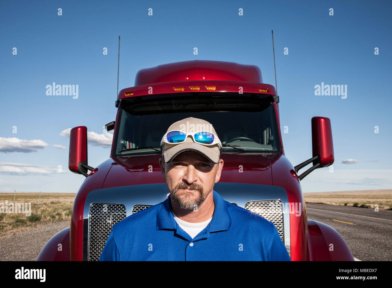 Portrait of a Caucasian man driver and his commercial truck Stock Photo ...