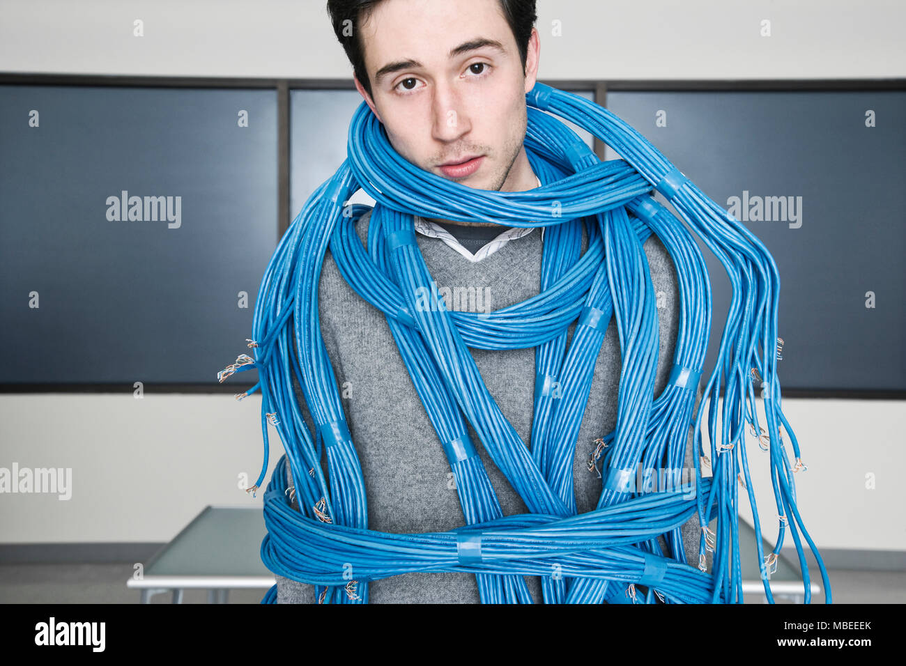Man tied up with cables hi-res stock photography and images - Alamy