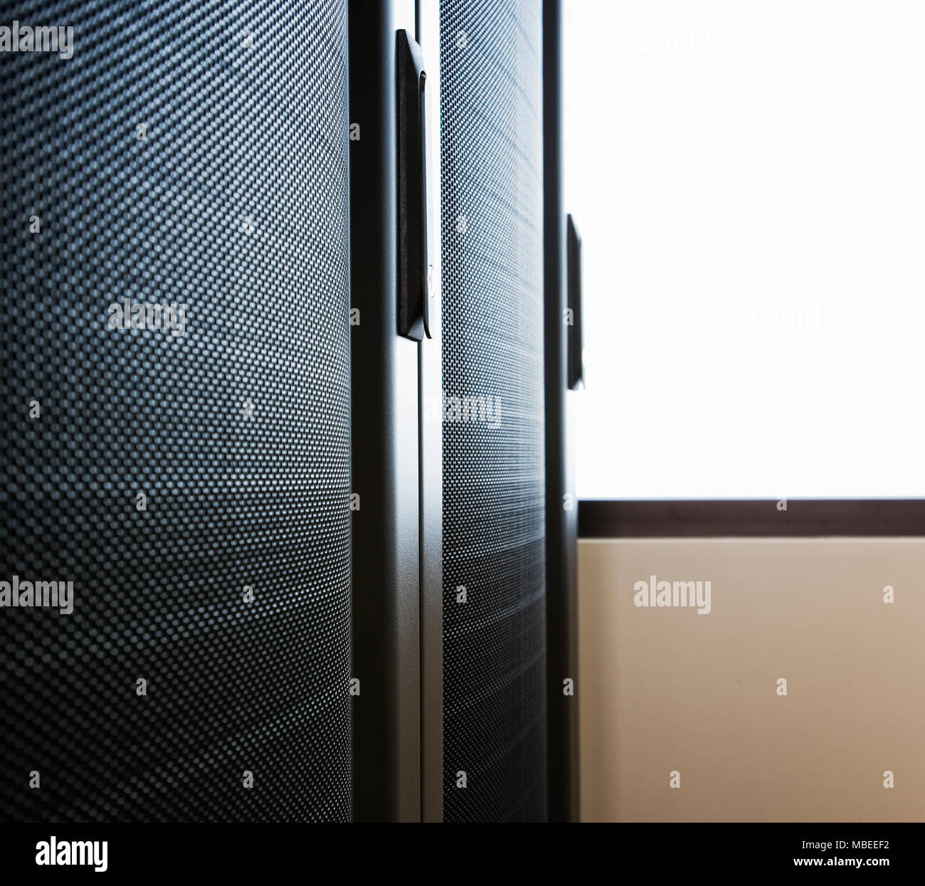 Rack housing servers in computer server farm Stock Photo - Alamy