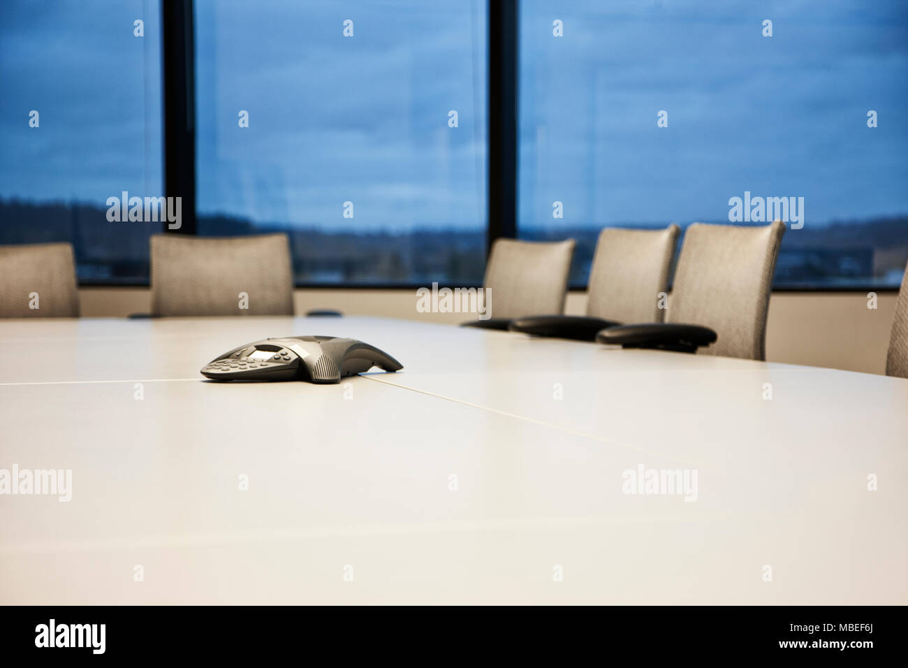 Closeup of a speaker phone on a conference table Stock Photo - Alamy