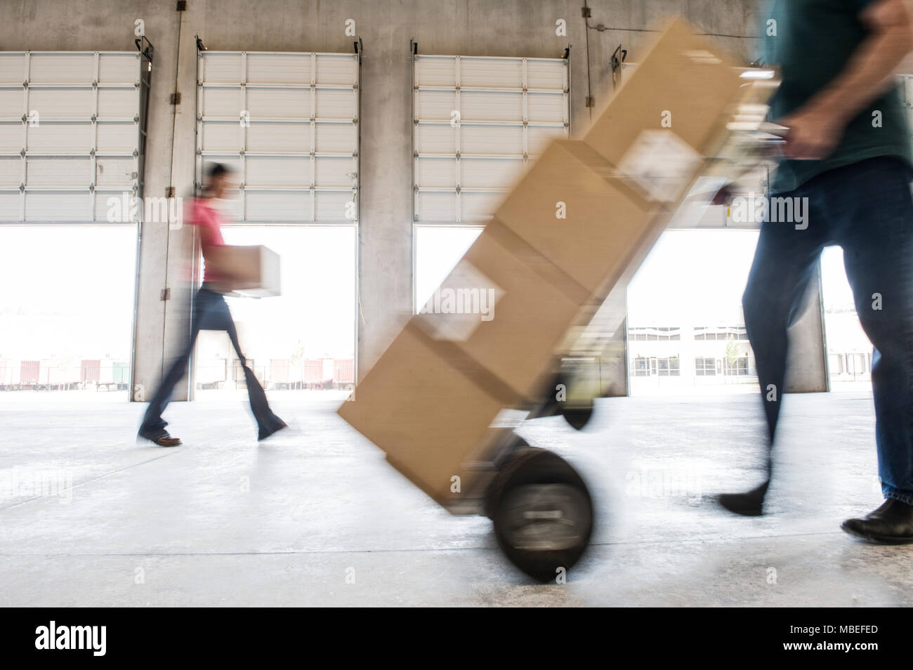 Man pushing a box into the truck hi-res stock photography and images ...
