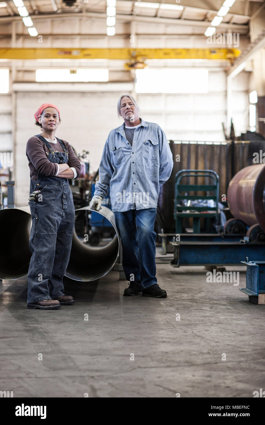 Full length factory overalls woman hi-res stock photography and images ...