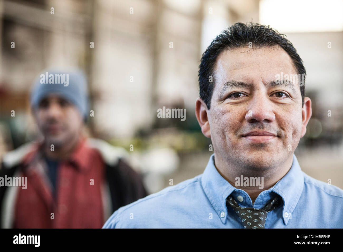 Hispanic man manager in a sheet metal factory Stock Photo - Alamy