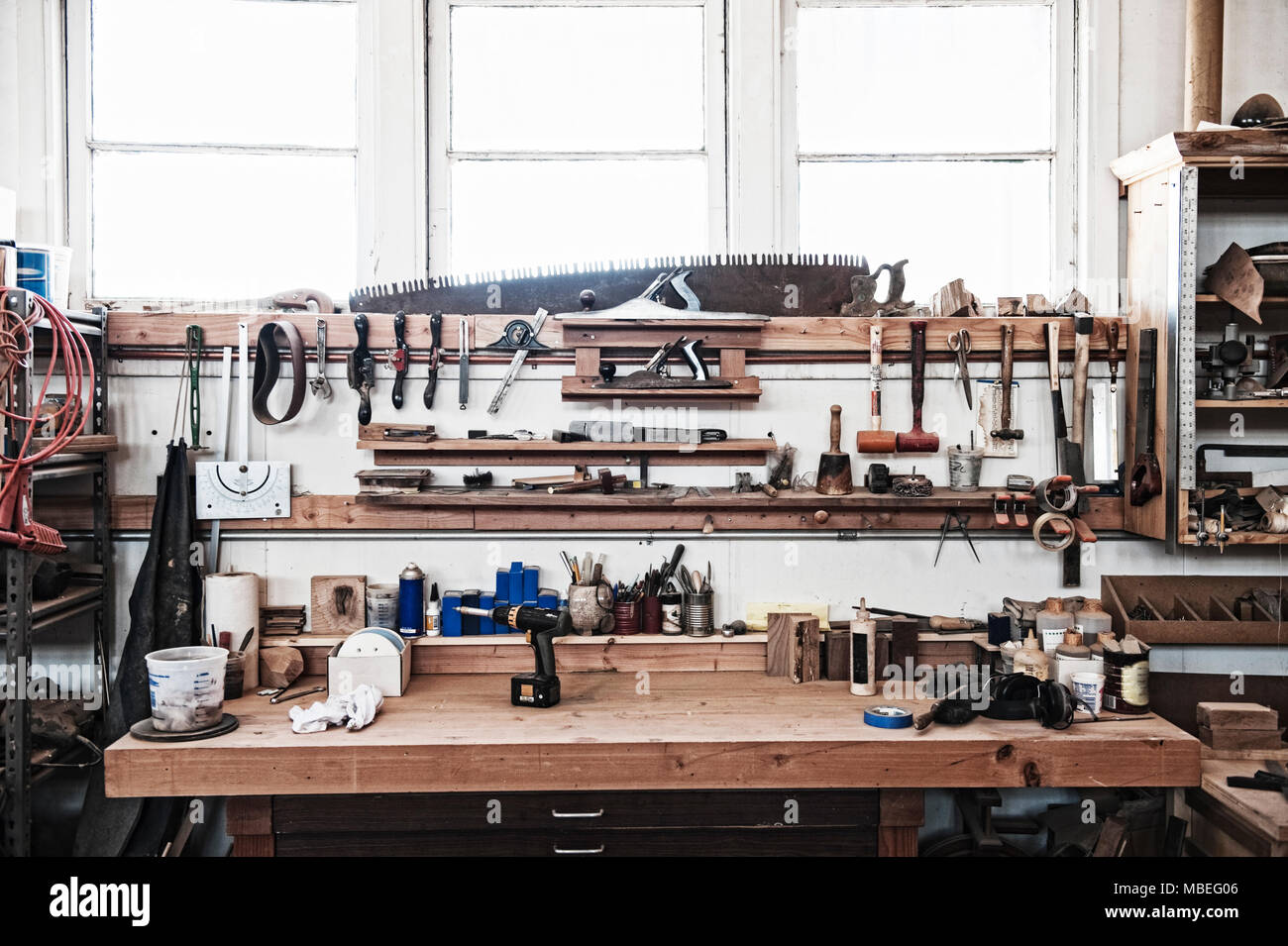 A work station with tools in a woodworking factory Stock Photo - Alamy