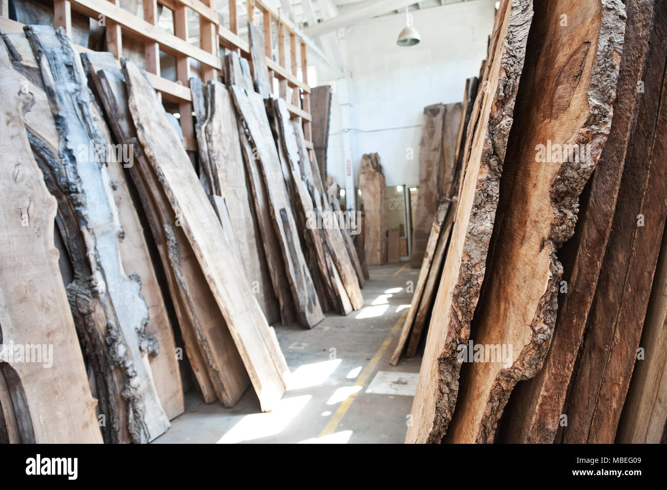 Reclaimed recycled cut slabs of wood in a woodowrking factory Stock ...