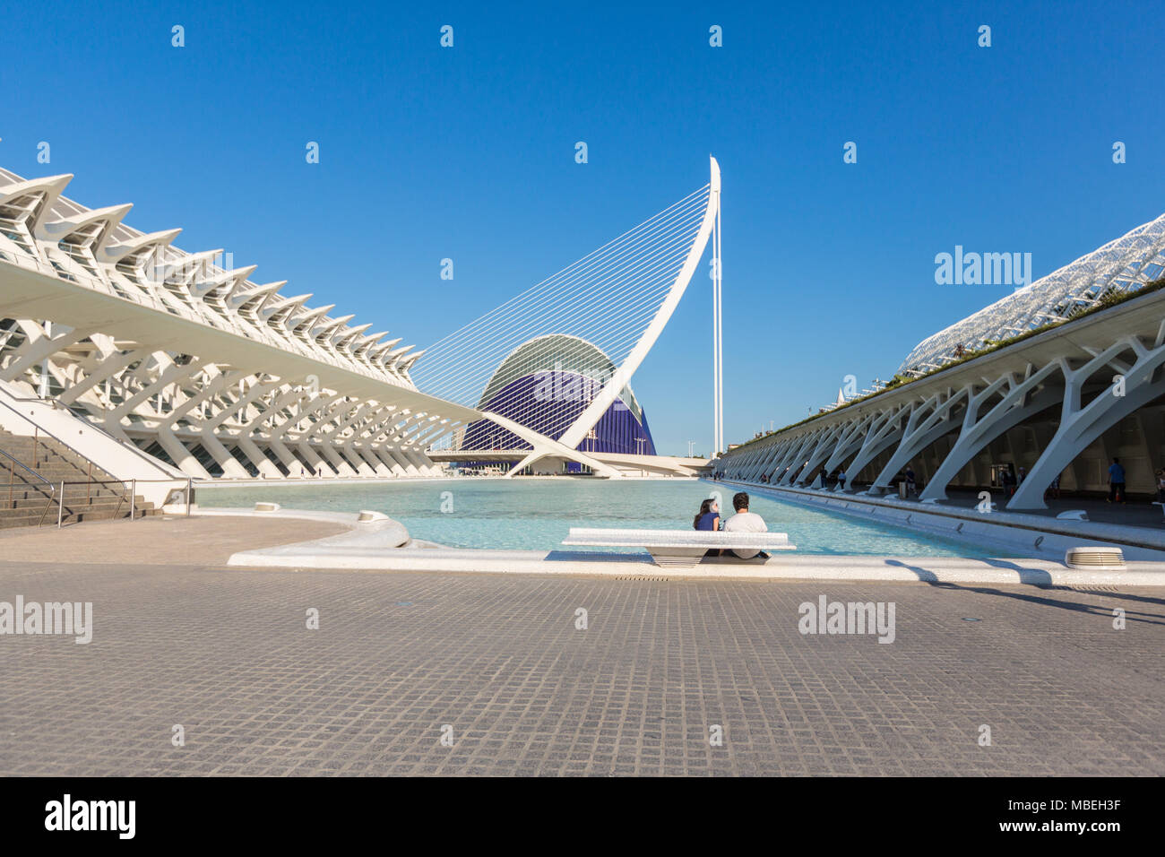 VALENCIA, SPAIN - JUNE 18, 2015: Young couple relaxes at the pool with ...