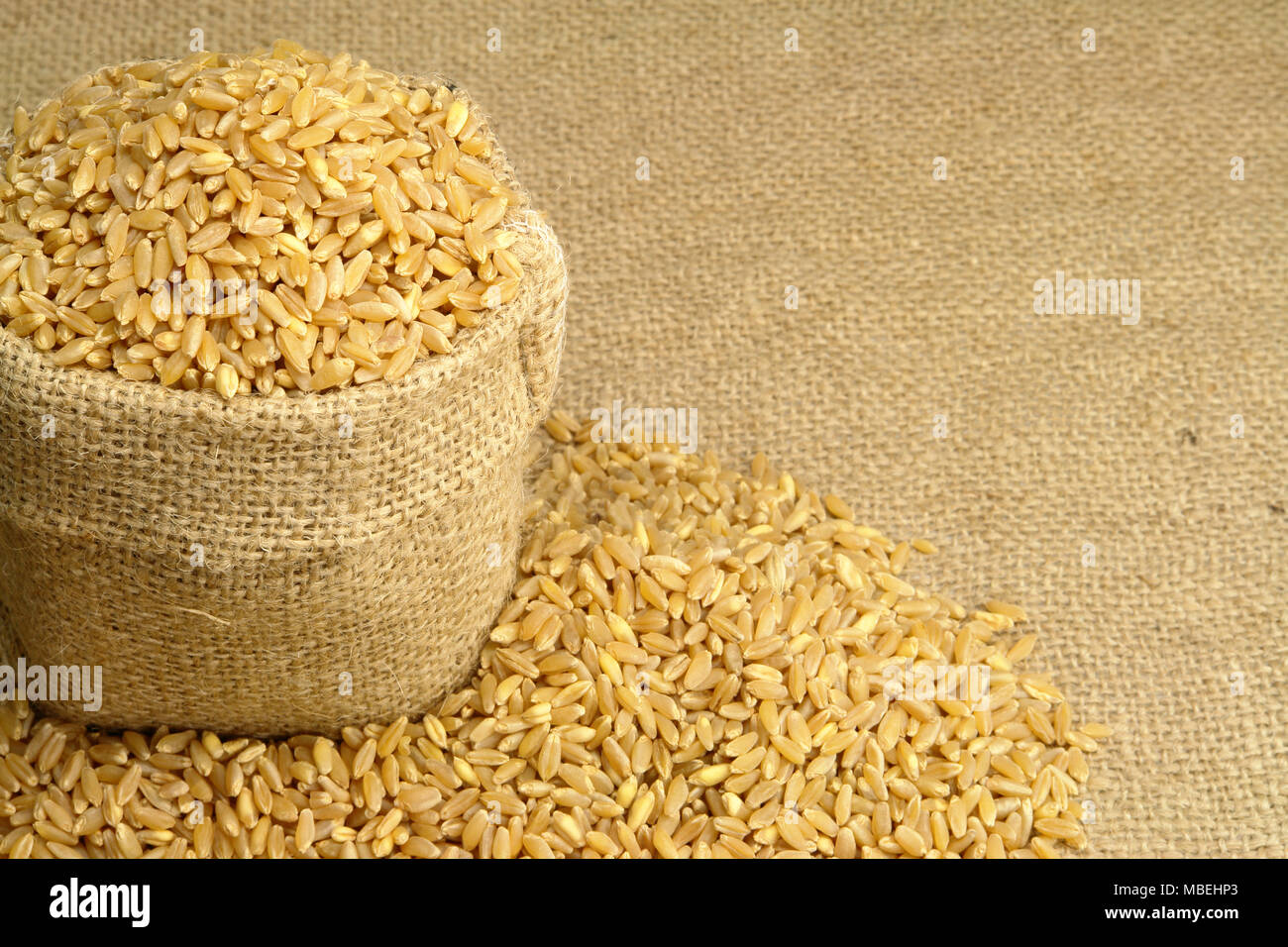 Wheat with bag on sackcloth Stock Photo - Alamy