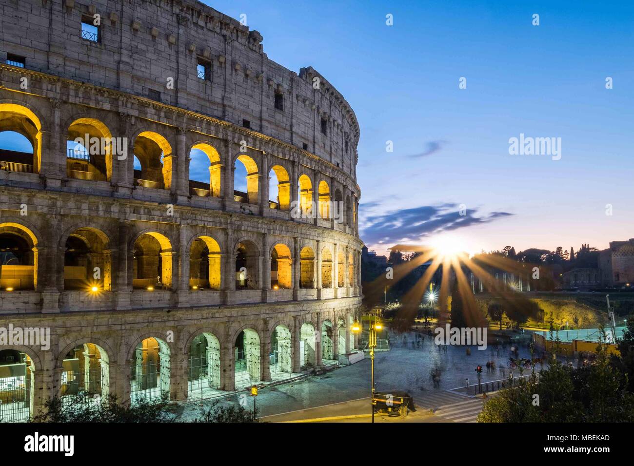 Sunray at sunset at the Colosseum, Rome Stock Photo - Alamy