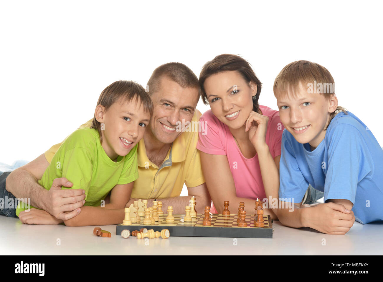 Family playing chess together hi-res stock photography and images - Alamy
