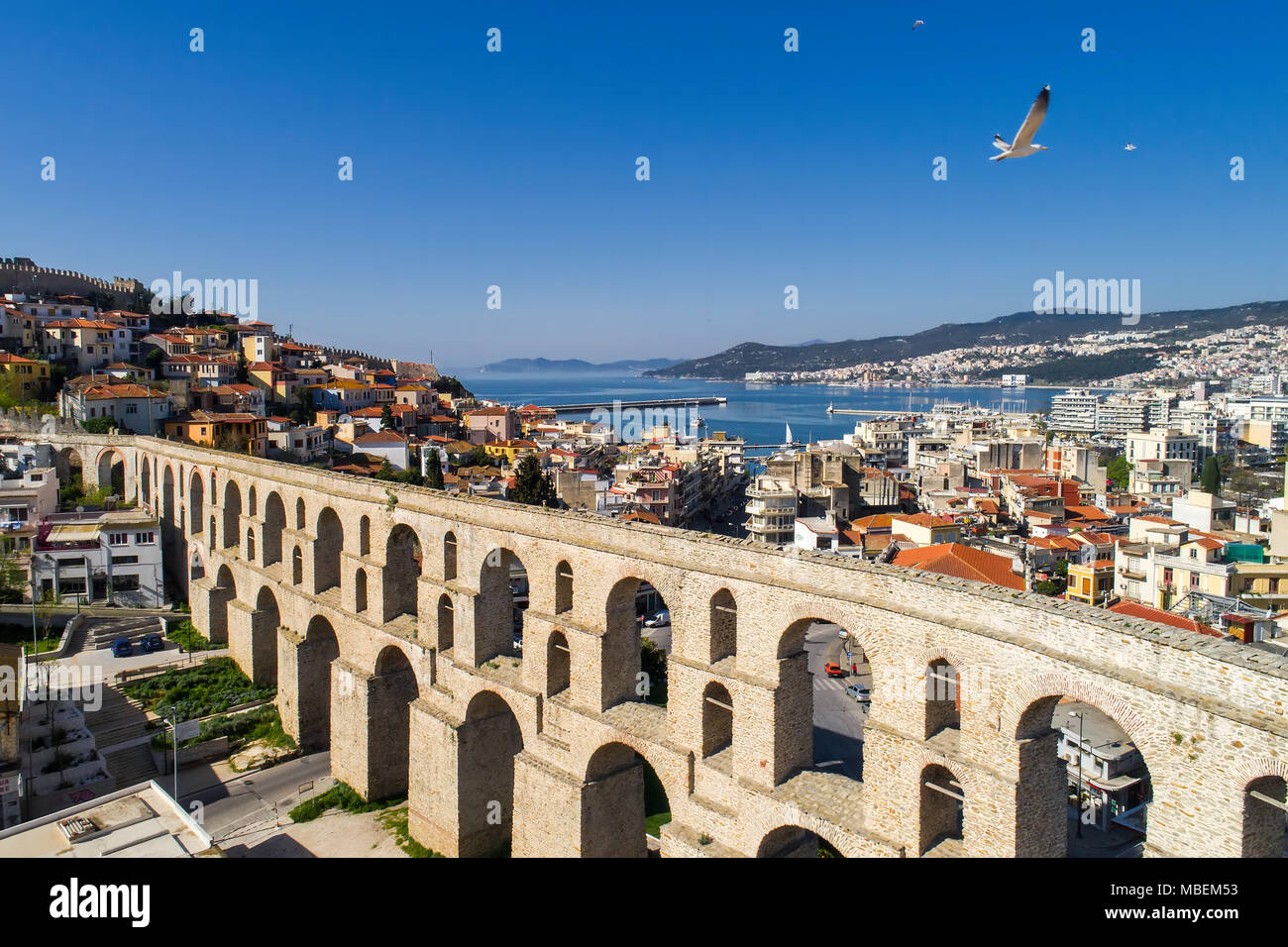 Aerial view the city of Kavala in northern Greek, ancient aqueduct ...