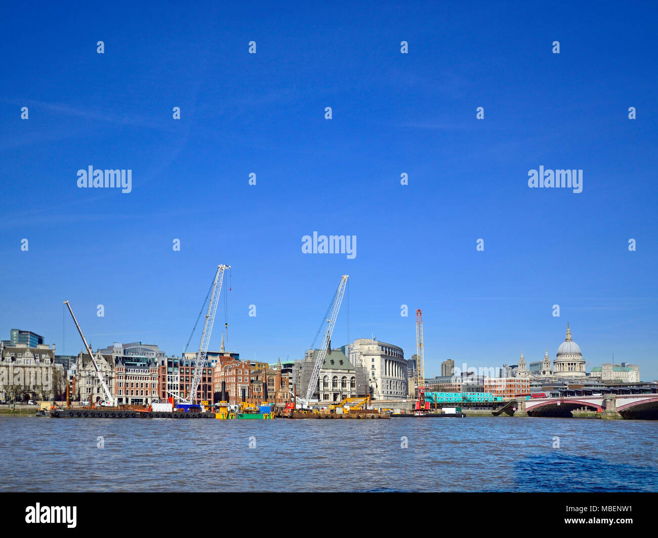 London, England, UK. Construction cranes on the Victoria Embankment ...