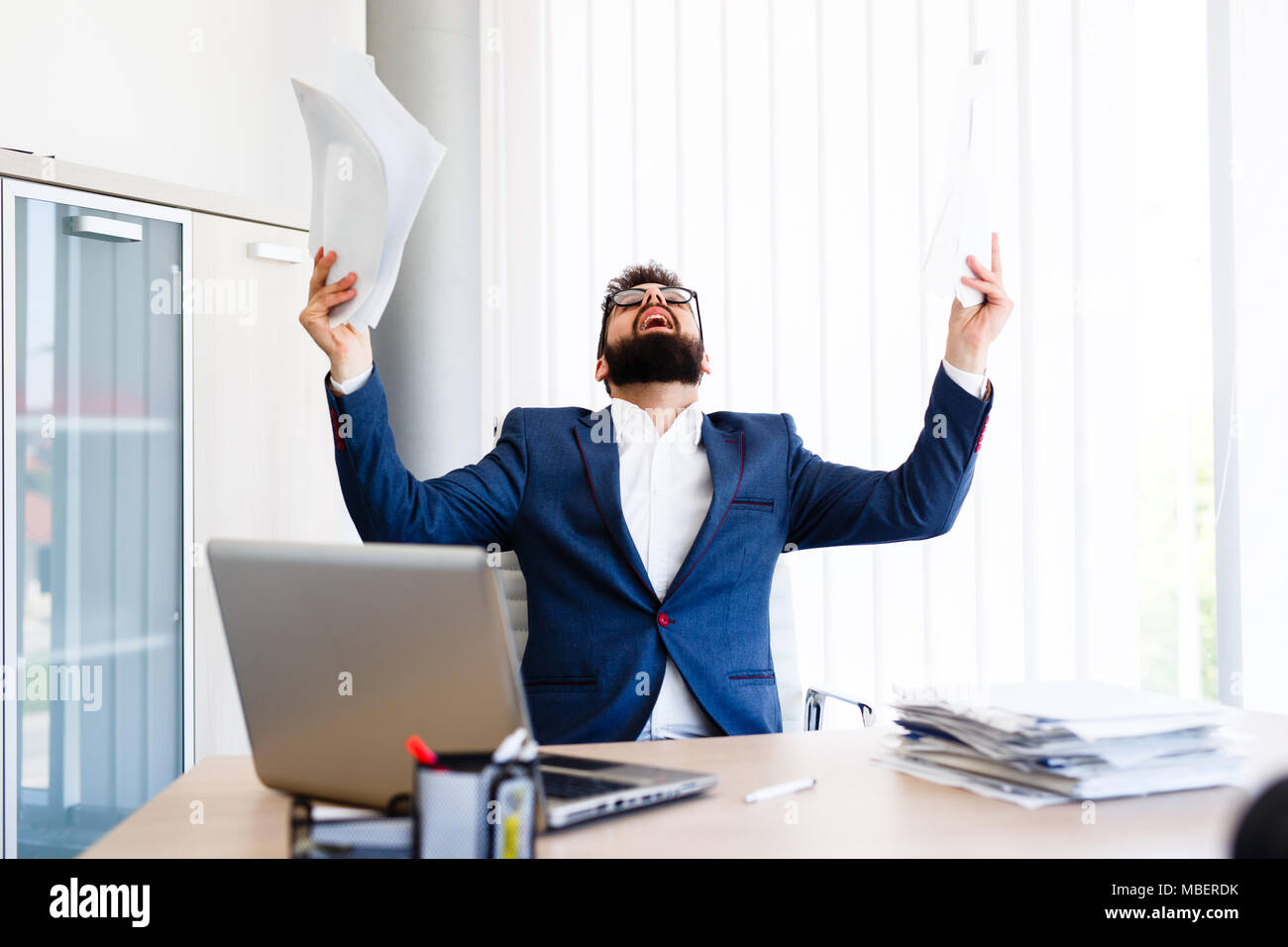 Desperate Young Banker At Workplace Stock Photo - Alamy