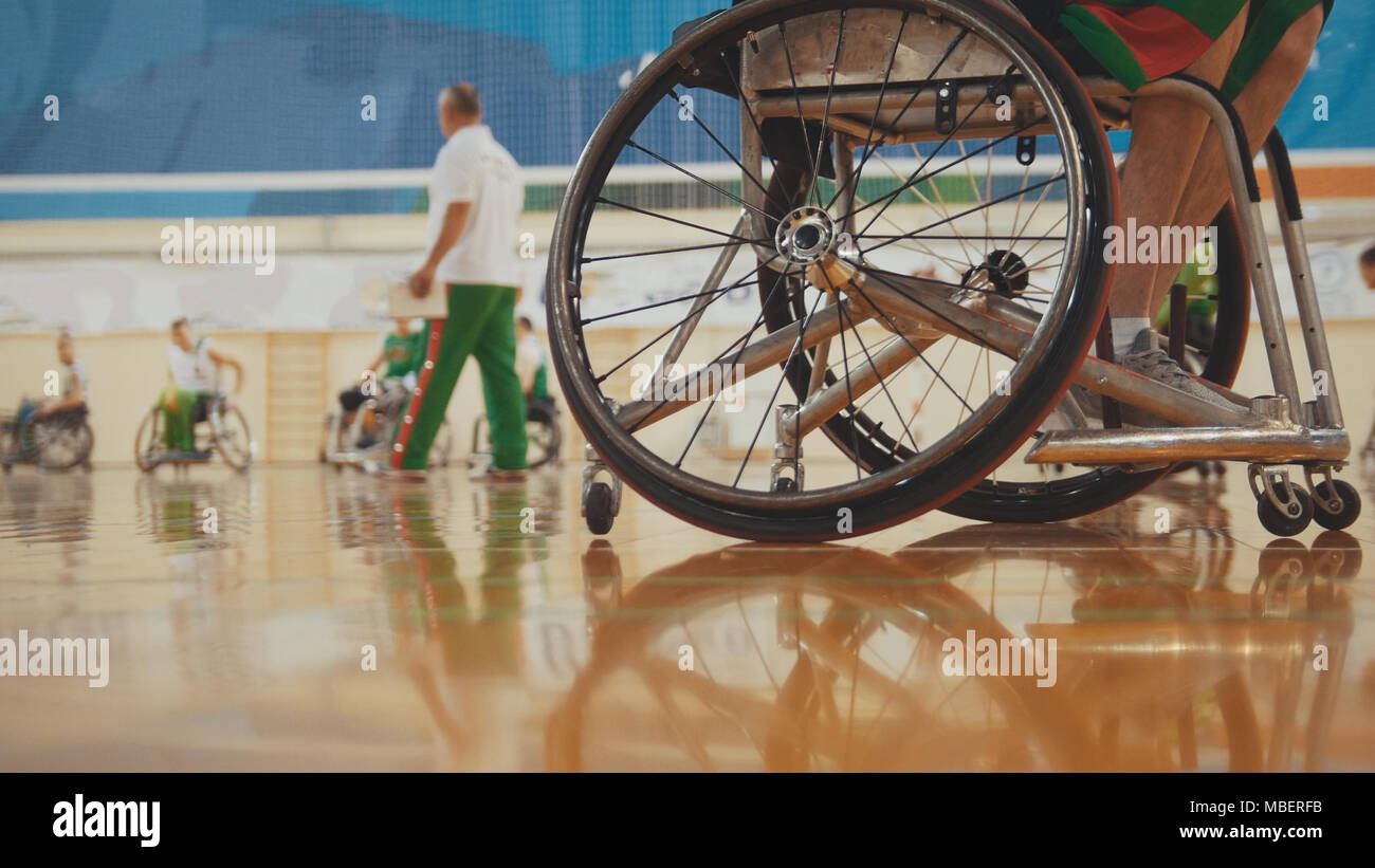 Wheel of handicapped basketball player in a wheelchair during sportive ...